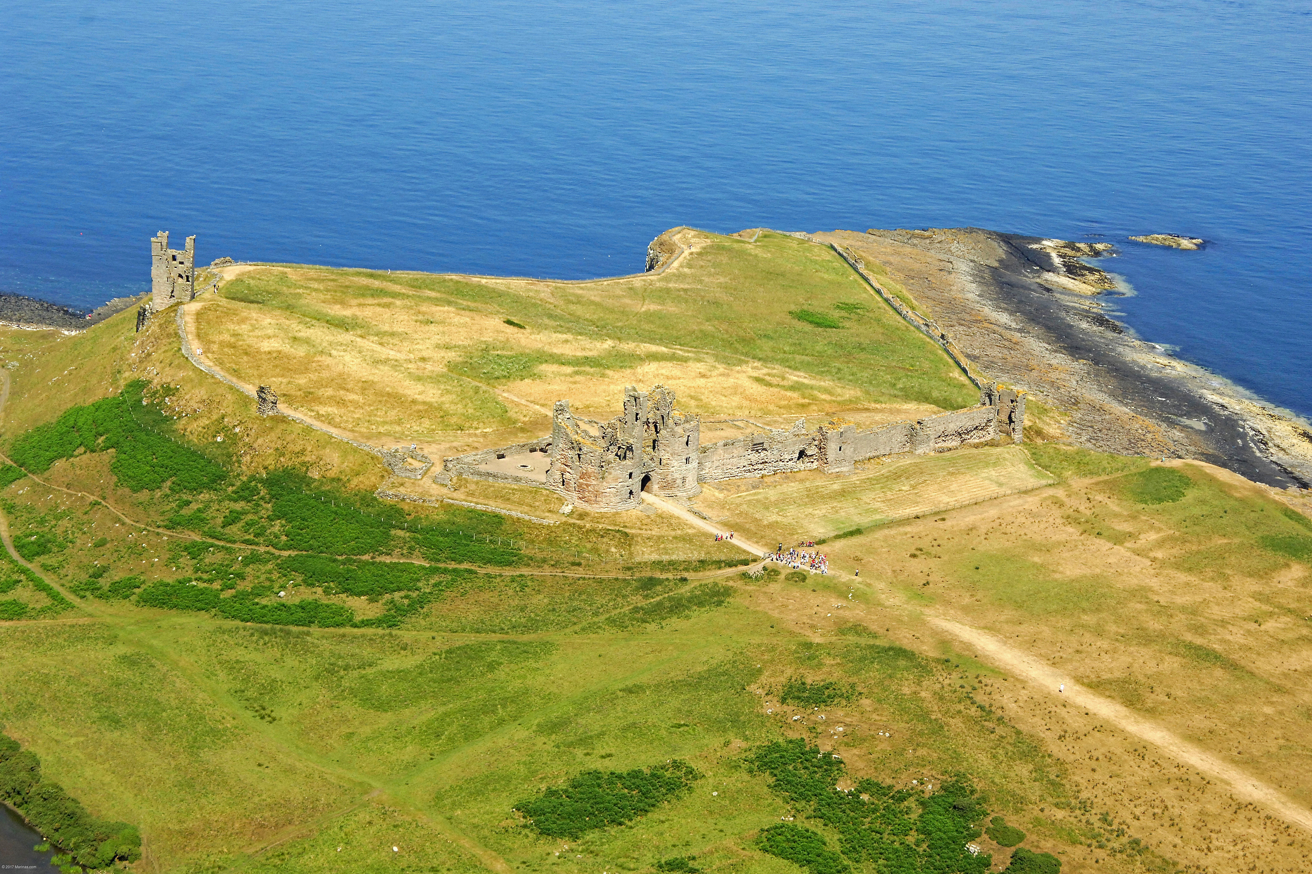 Dunstanburgh Castle Landmark in near Craster, GB, United Kingdom ...