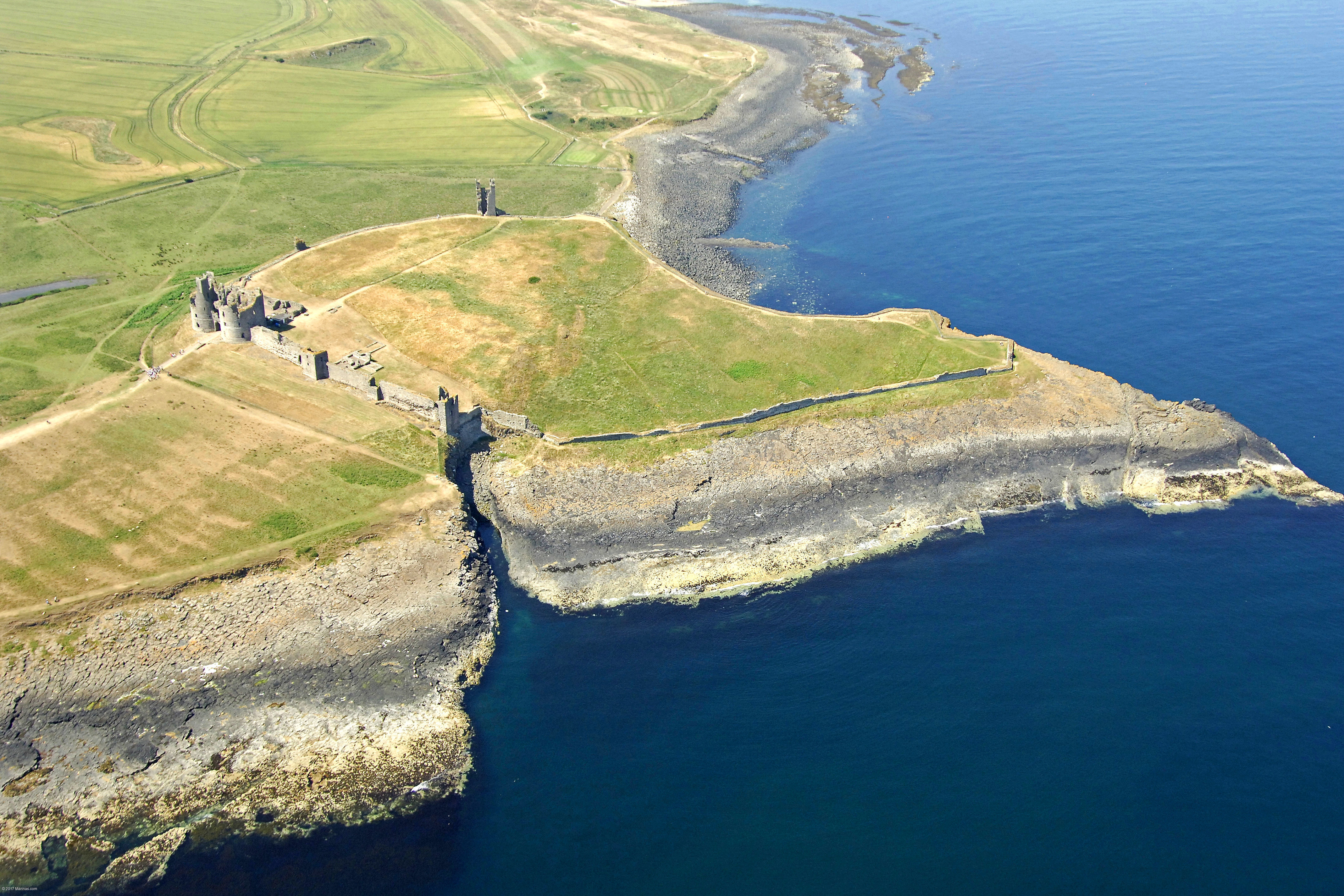 Dunstanburgh Castle Landmark in near Craster, GB, United Kingdom ...