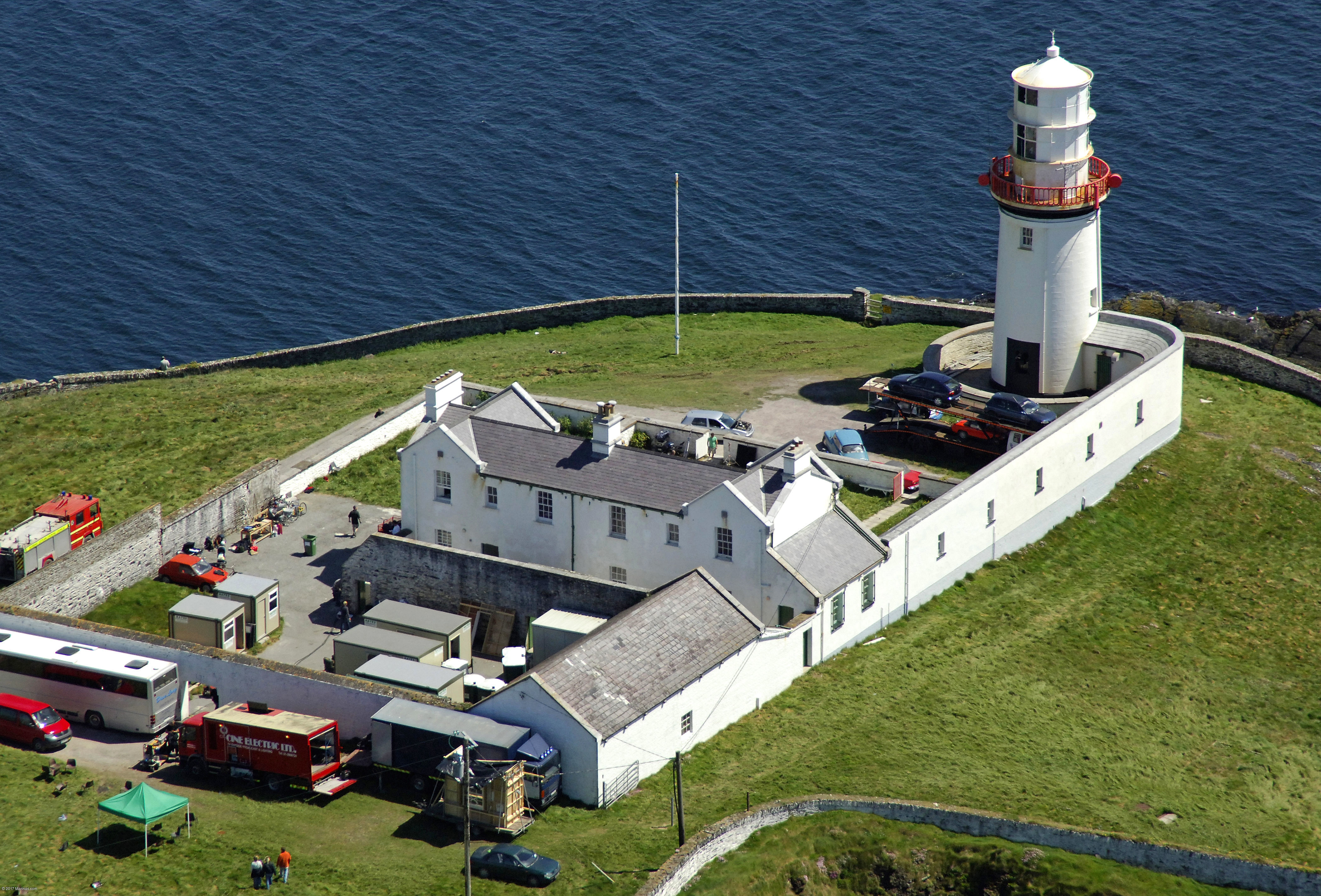 Galley Head Lighthouse in 40 miles west of Cork, Dun Deide headland ...